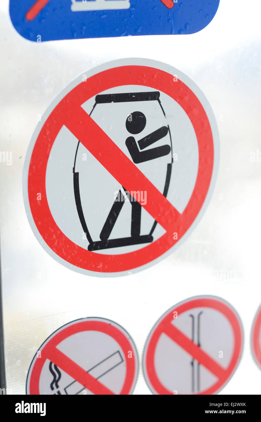 Ski lift warning sign sticker Stock Photo - Alamy