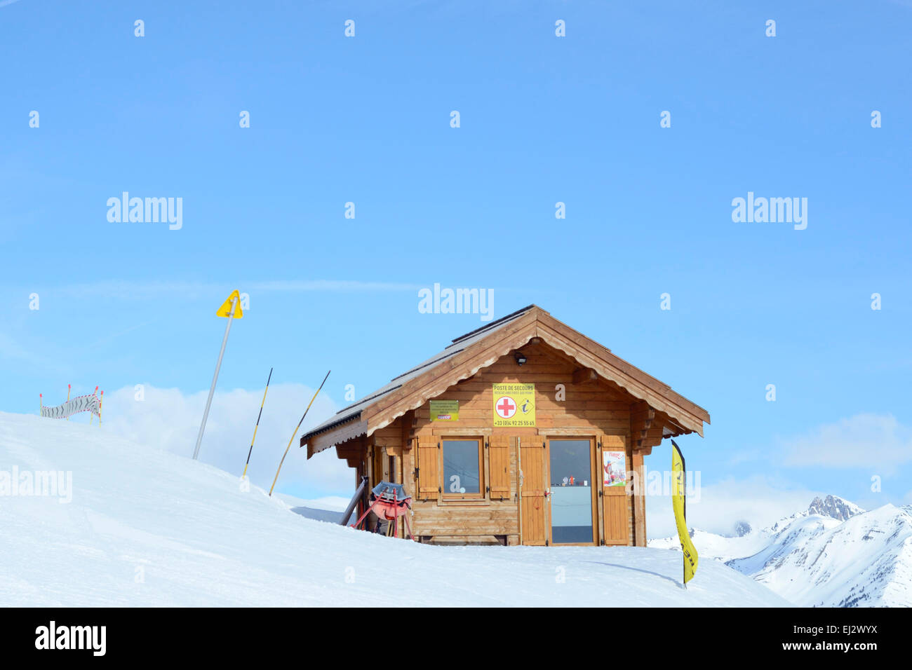Wooden snow hut on ski slope Stock Photo - Alamy