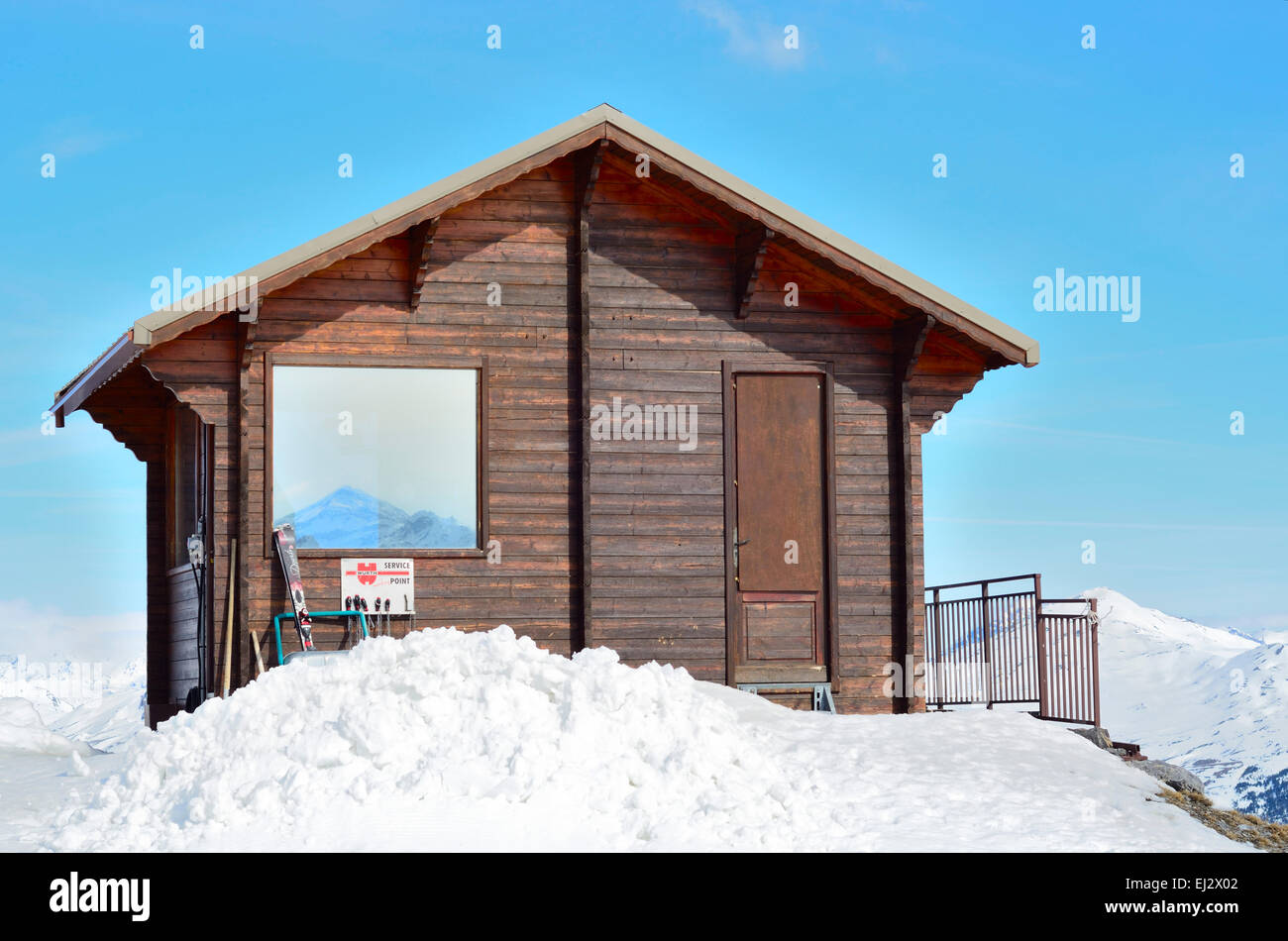 Wooden snow hut on ski slope Stock Photo - Alamy