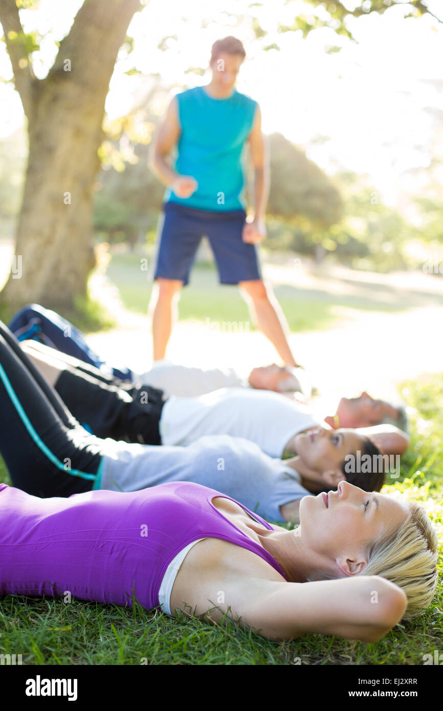 Happy athletic group training Stock Photo - Alamy