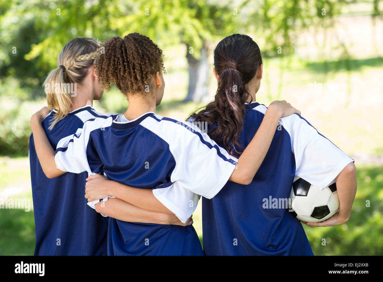 Pretty football players celebrating their win Stock Photo - Alamy