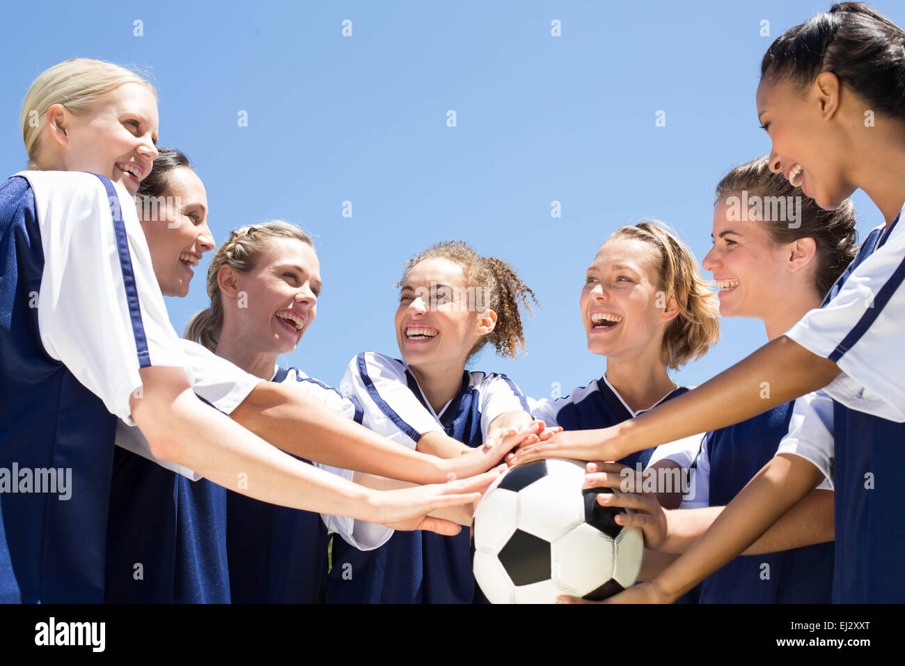 Pretty football players celebrating their win Stock Photo - Alamy