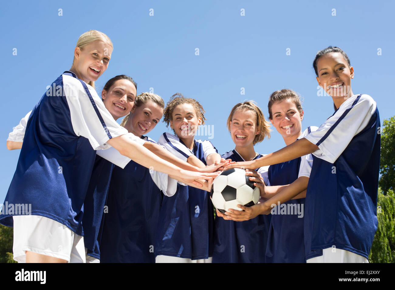 Pretty football players celebrating their win Stock Photo - Alamy
