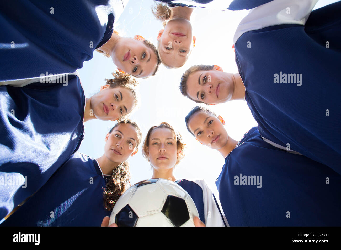 Pretty football players smiling at camera Stock Photo - Alamy