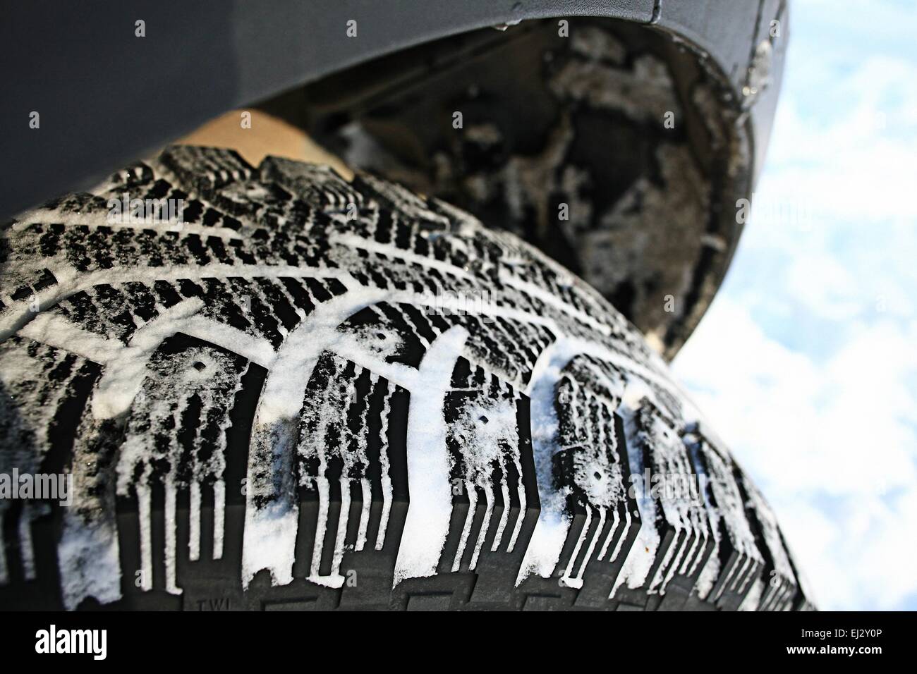 tread wheels Winter studded tires snow Stock Photo - Alamy