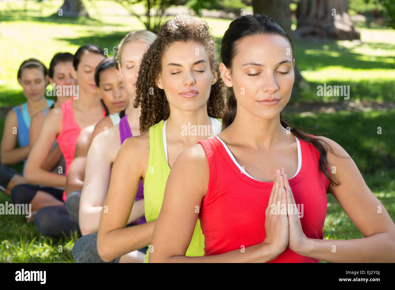 Yoga fitness group woman meditating hi-res stock photography and images ...