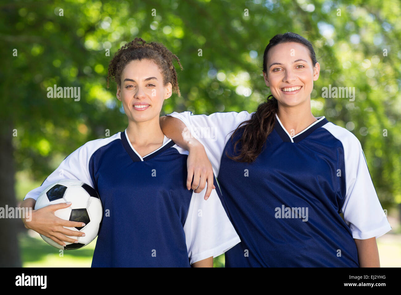Smiling soccer players ball hi-res stock photography and images - Alamy