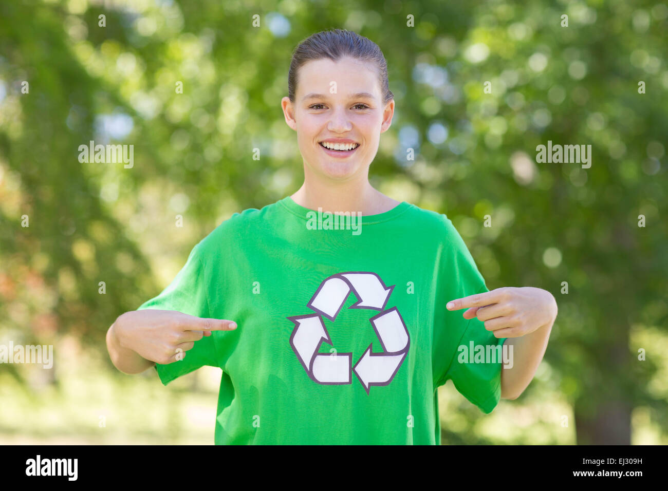 Happy environmental activist in the park Stock Photo - Alamy