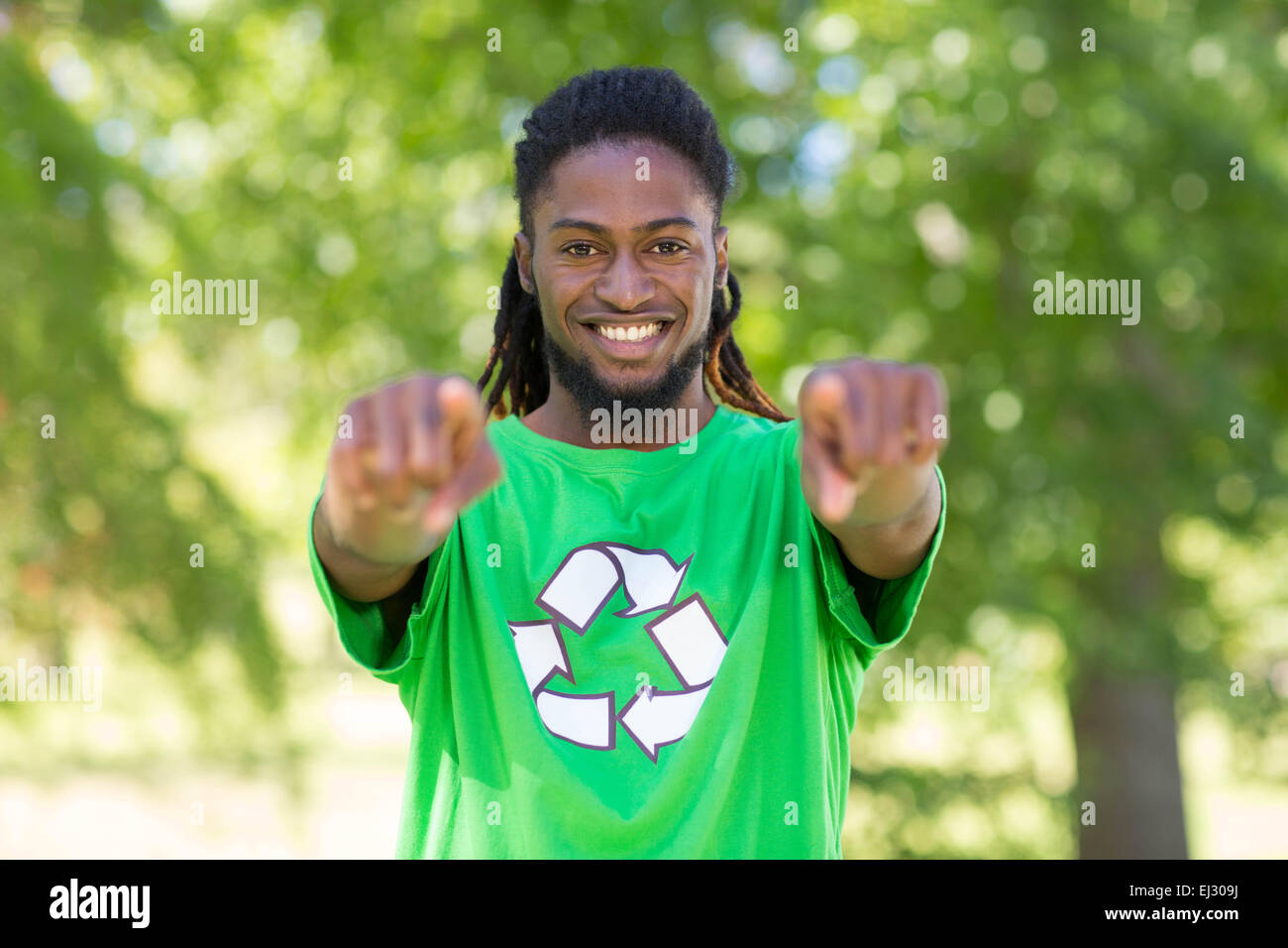 Happy environmental activist in the park Stock Photo - Alamy
