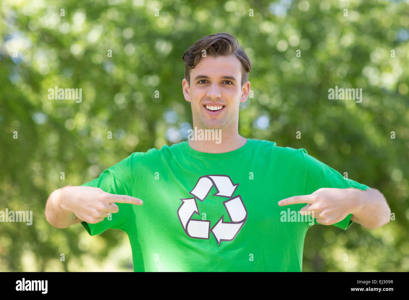 Happy environmental activist in the park Stock Photo - Alamy