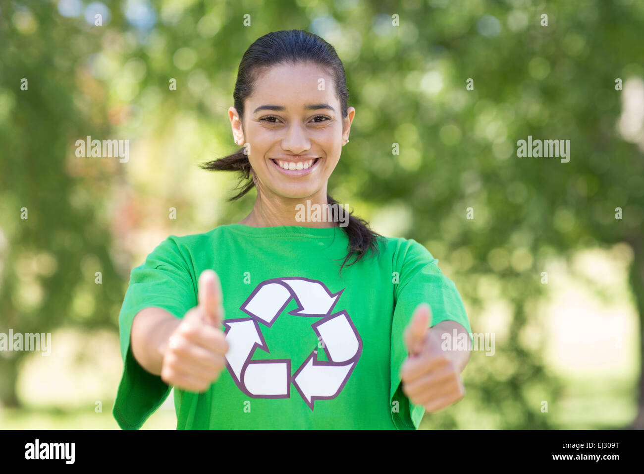 Happy environmental activist in the park Stock Photo - Alamy