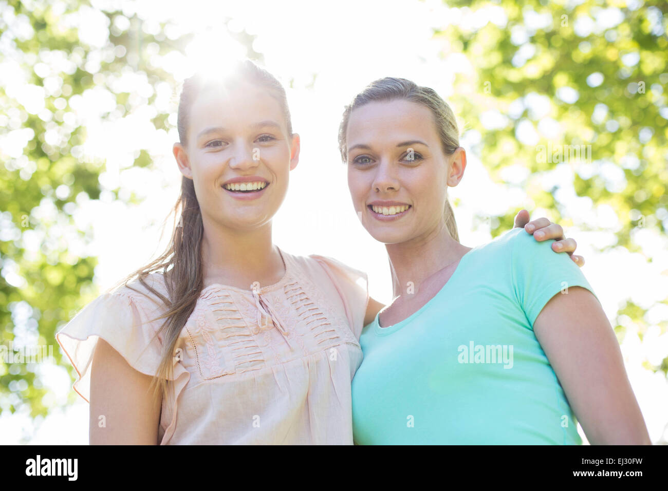 Smiling friends camera in hi-res stock photography and images - Alamy