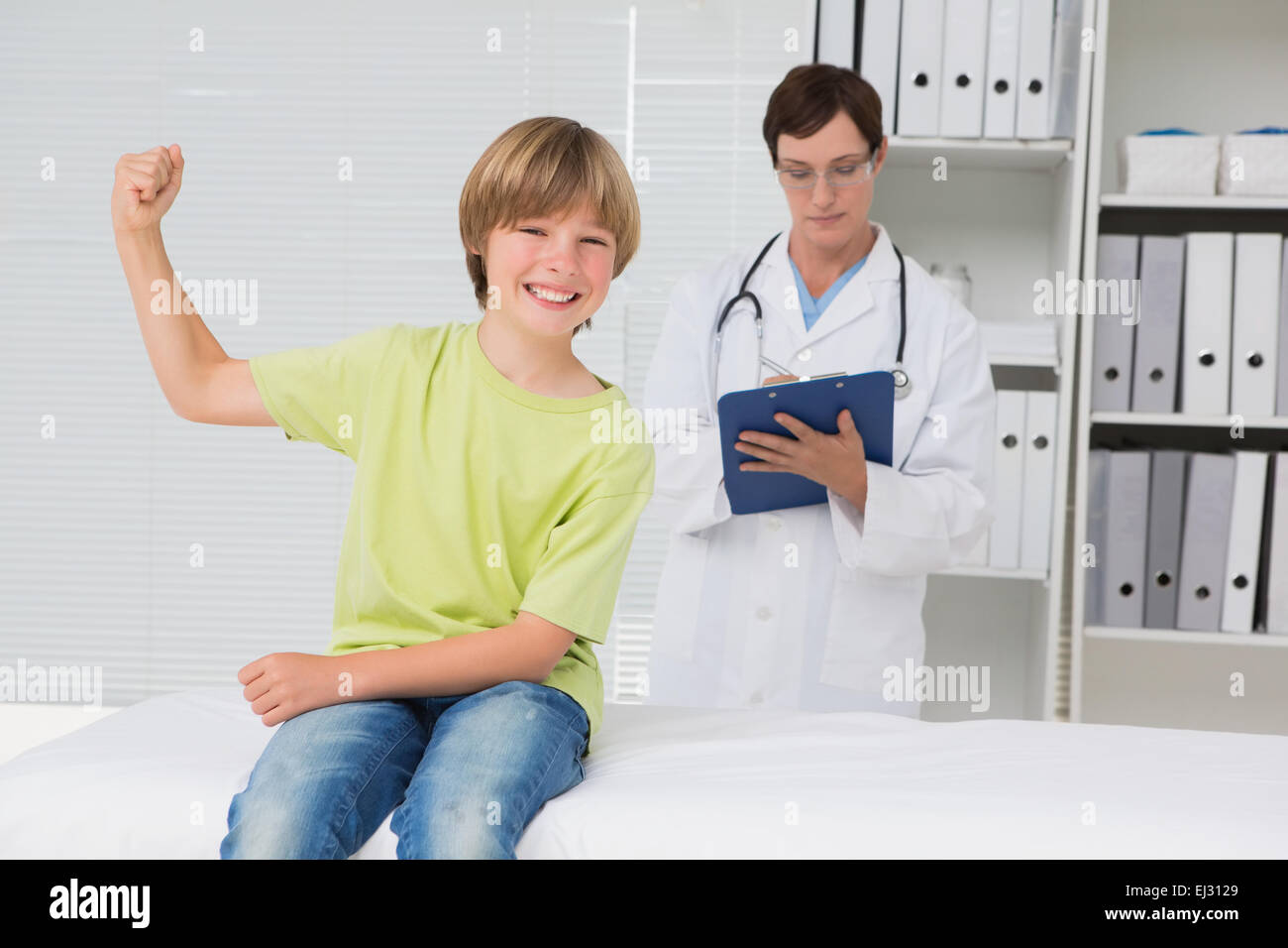 Little sick boy smiling camera hi-res stock photography and images - Alamy