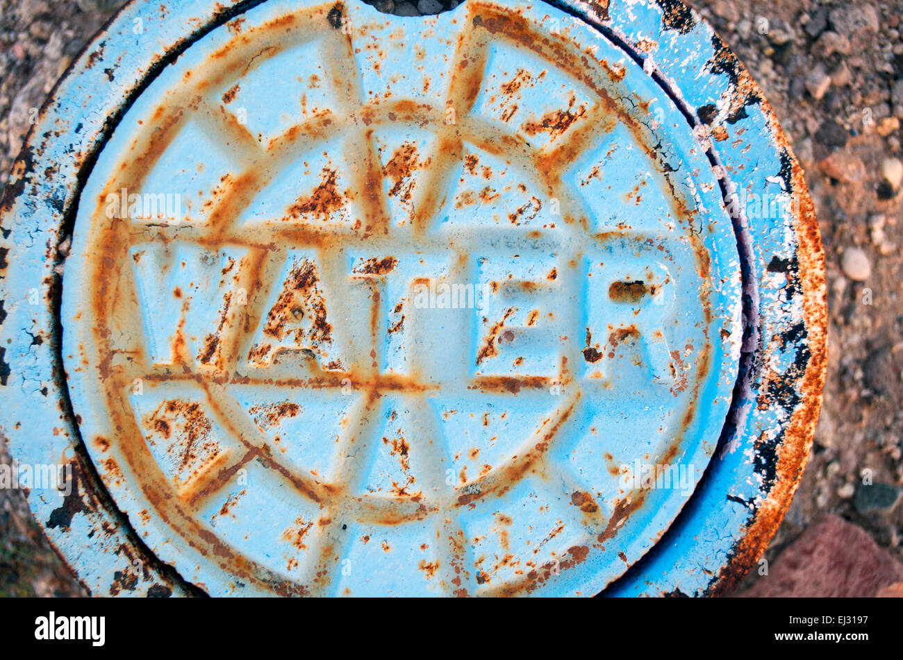Round Iron Water Cover With The Word Water Stock Photo - Alamy
