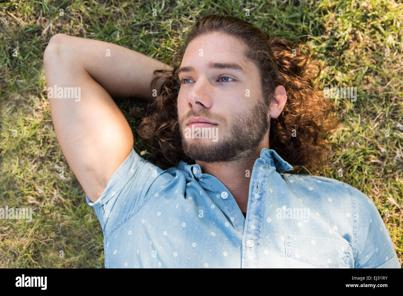 Man lying down hi-res stock photography and images - Alamy