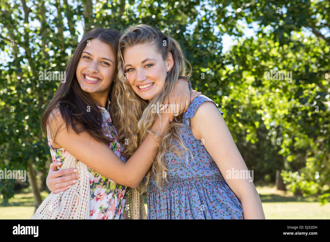 Stylish friends hugging hi-res stock photography and images - Alamy