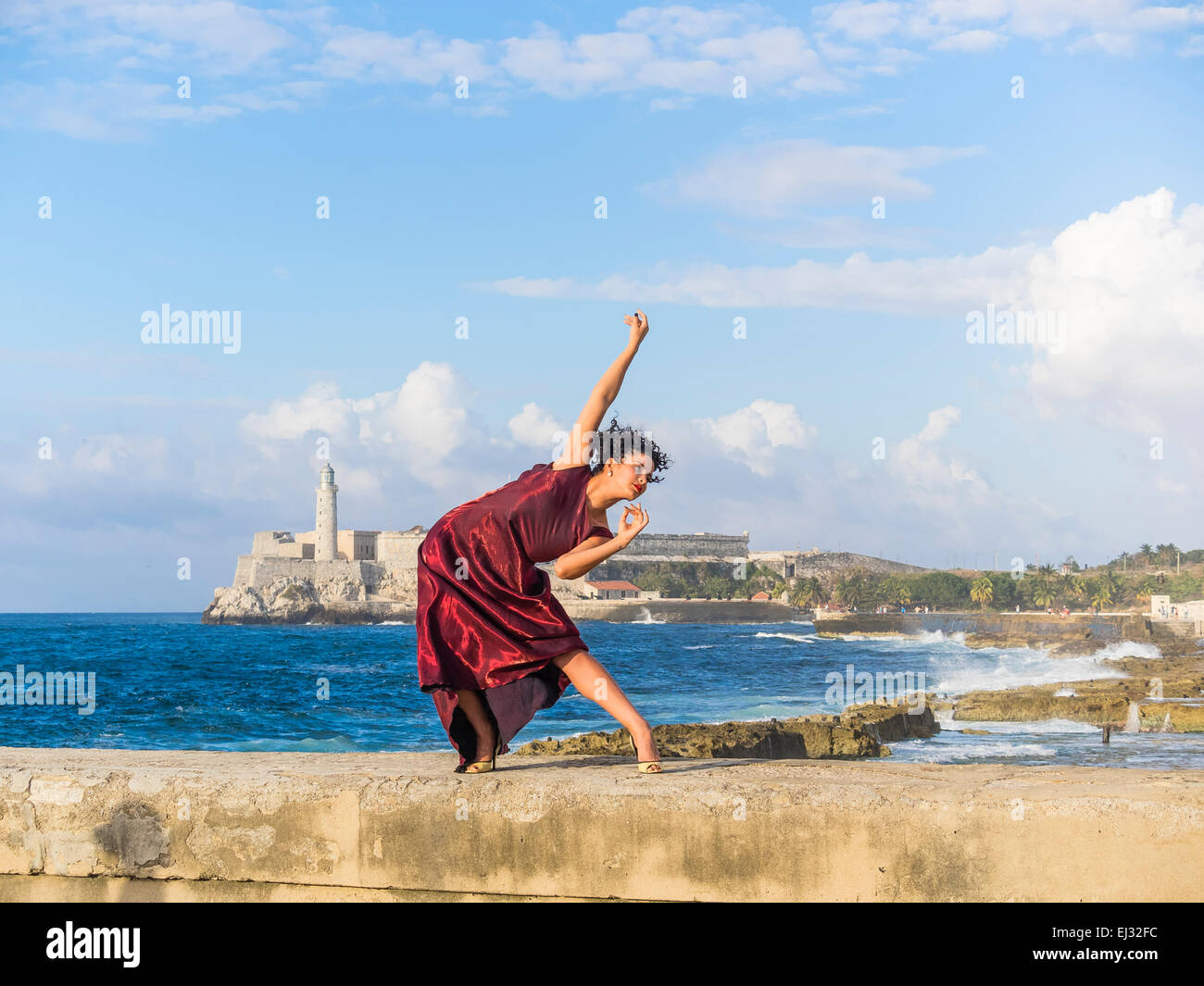 26 year Hispanic Cuban female model posing in maroon dress on the ...
