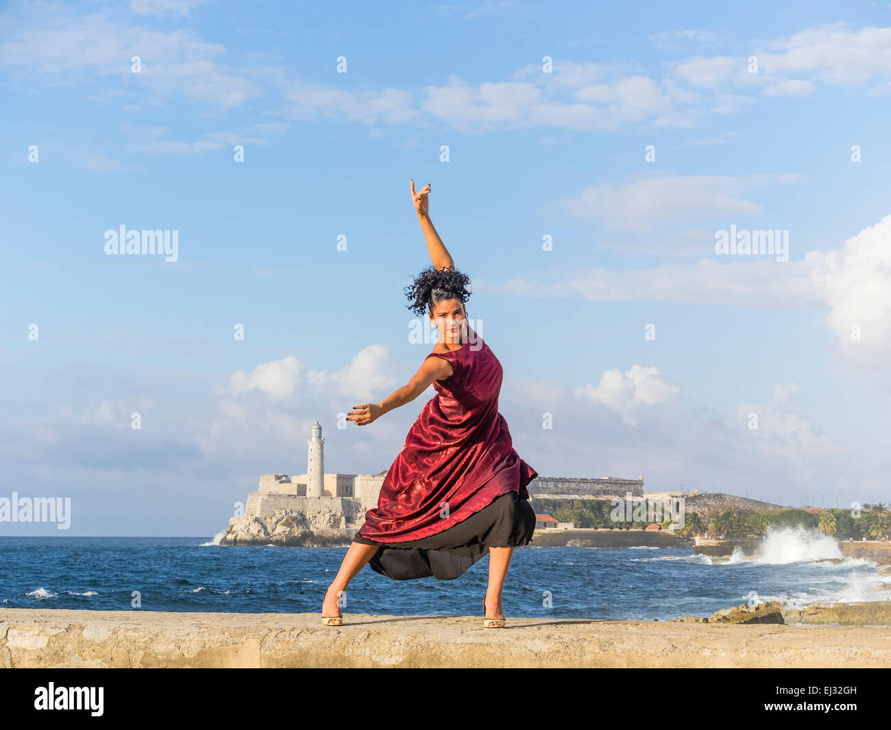 26 year Hispanic Cuban female model posing in maroon dress on the ...