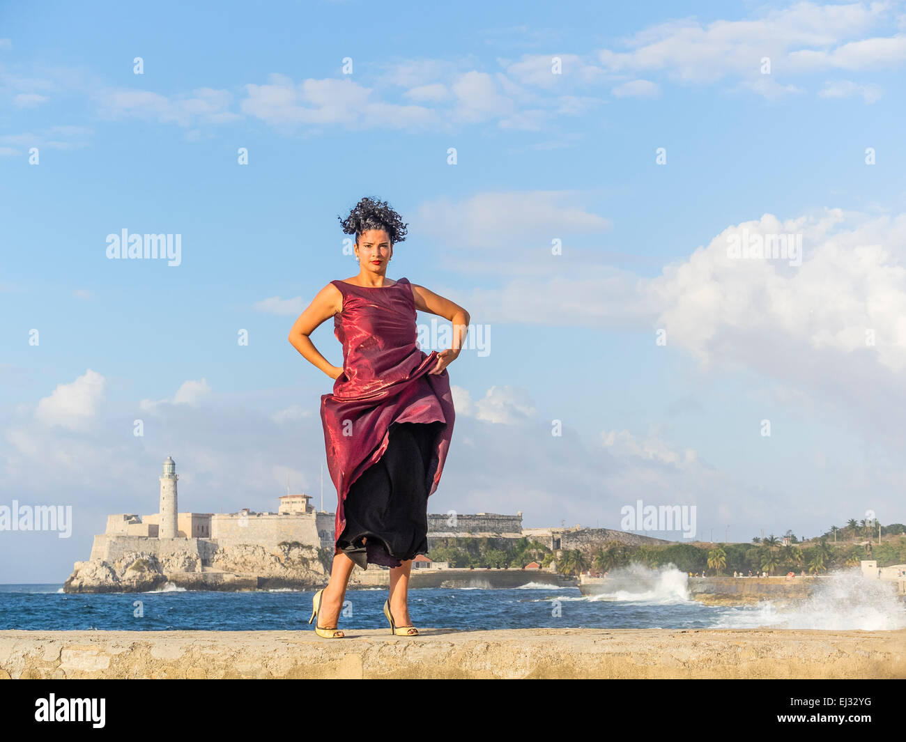 26 year Hispanic Cuban female model posing in maroon dress on the ...
