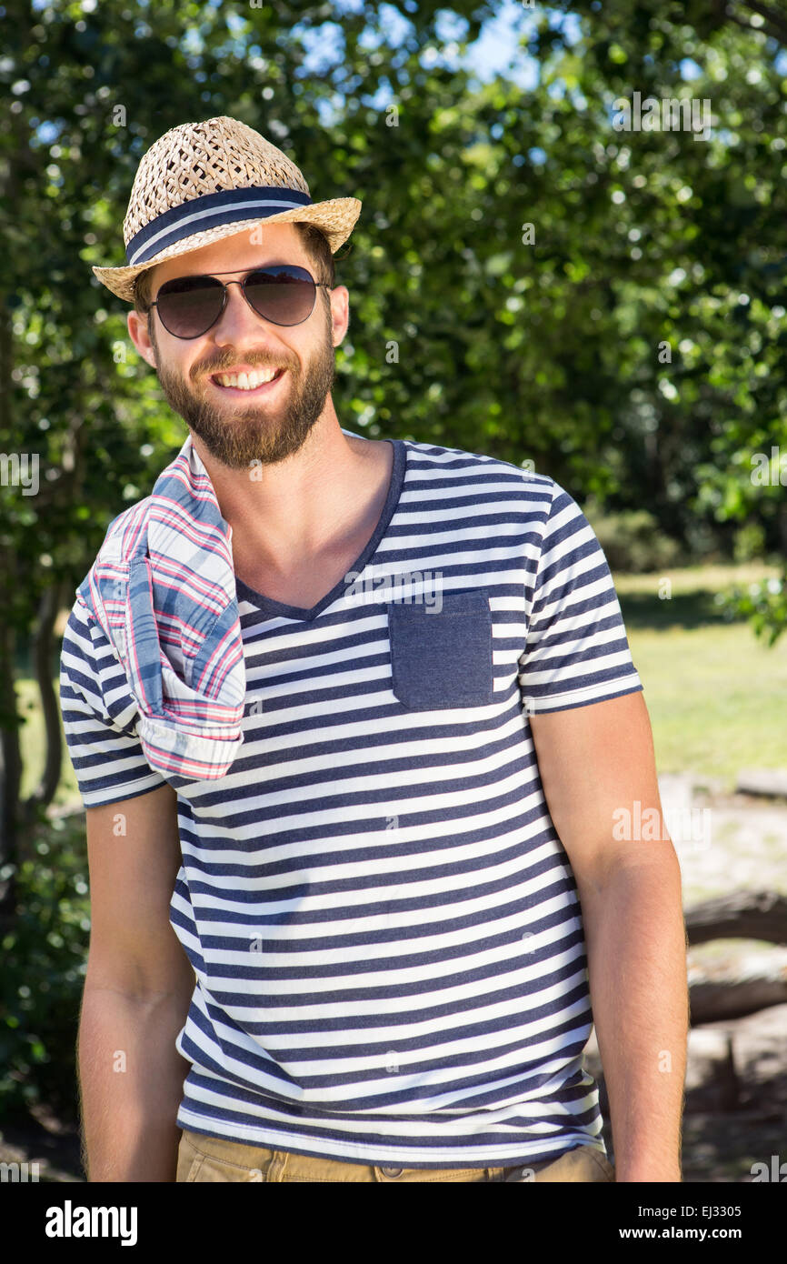Handsome hipster smiling at camera Stock Photo - Alamy