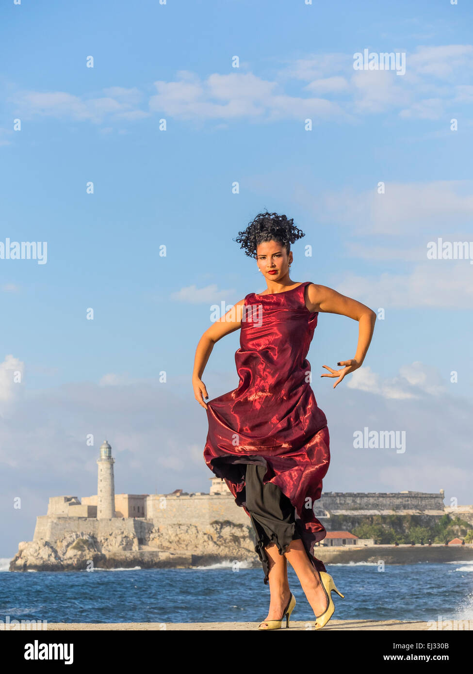 26 year Hispanic Cuban female model posing in maroon dress on the ...