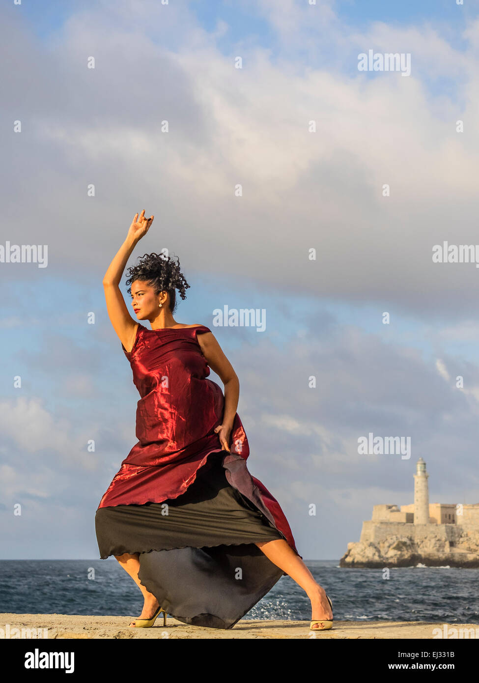 26 year Hispanic Cuban female model posing in maroon dress on the ...