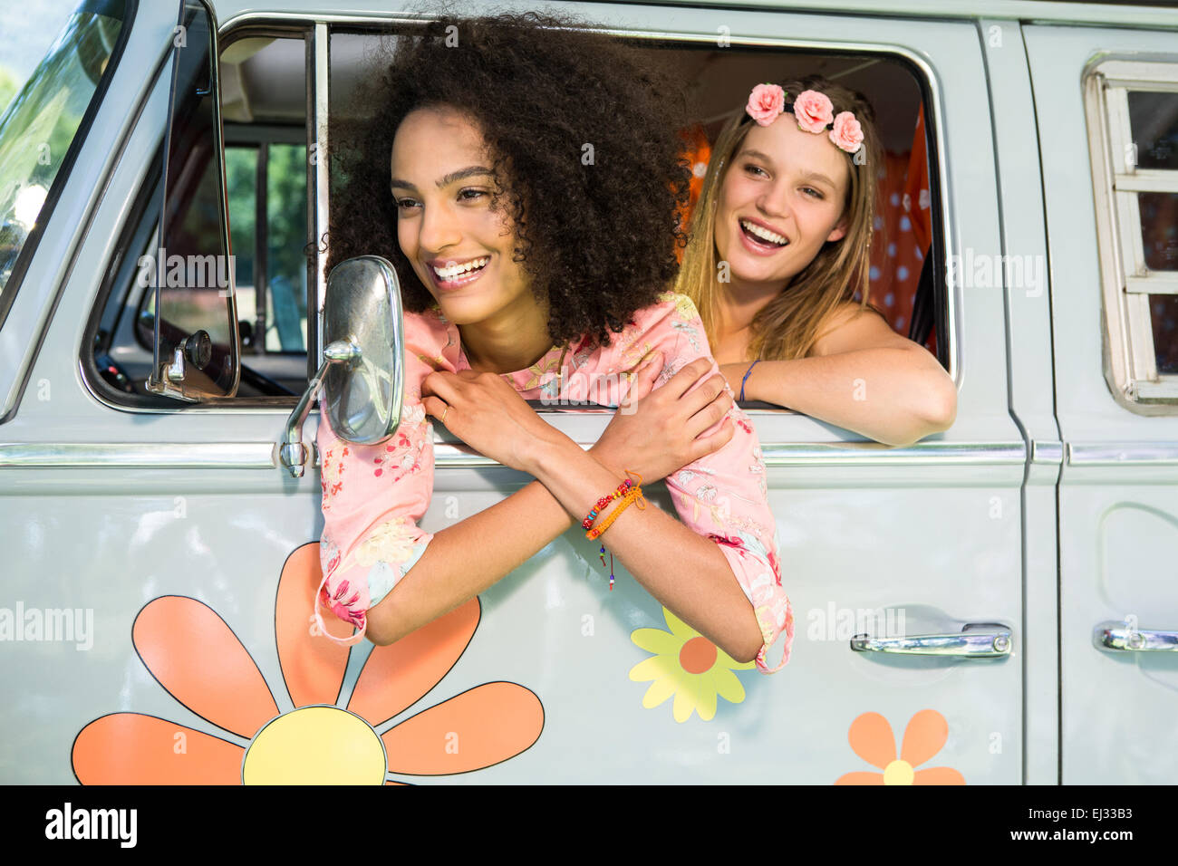 Happy friends on a road trip Stock Photo - Alamy