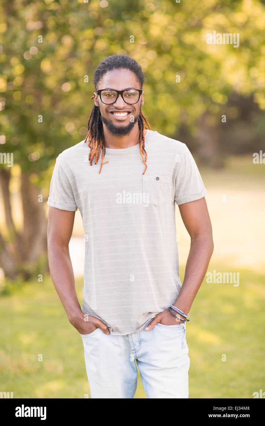 Handsome hipster smiling at camera Stock Photo - Alamy