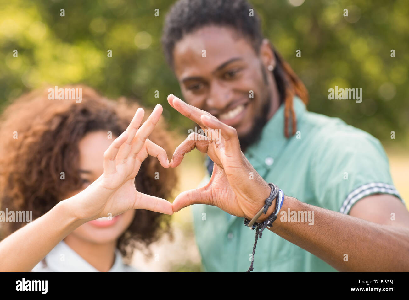 Couple hands heart hi-res stock photography and images - Alamy