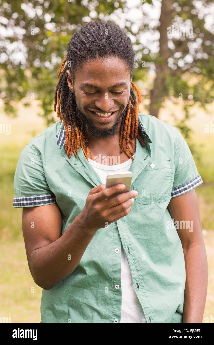 Happy young man with smartphone hi-res stock photography and images - Alamy