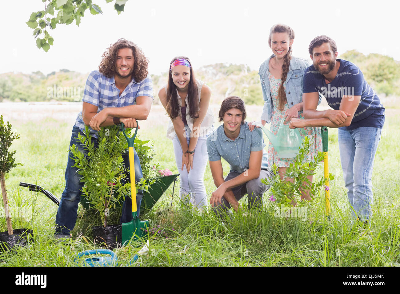 Happy friends gardening hi-res stock photography and images - Alamy