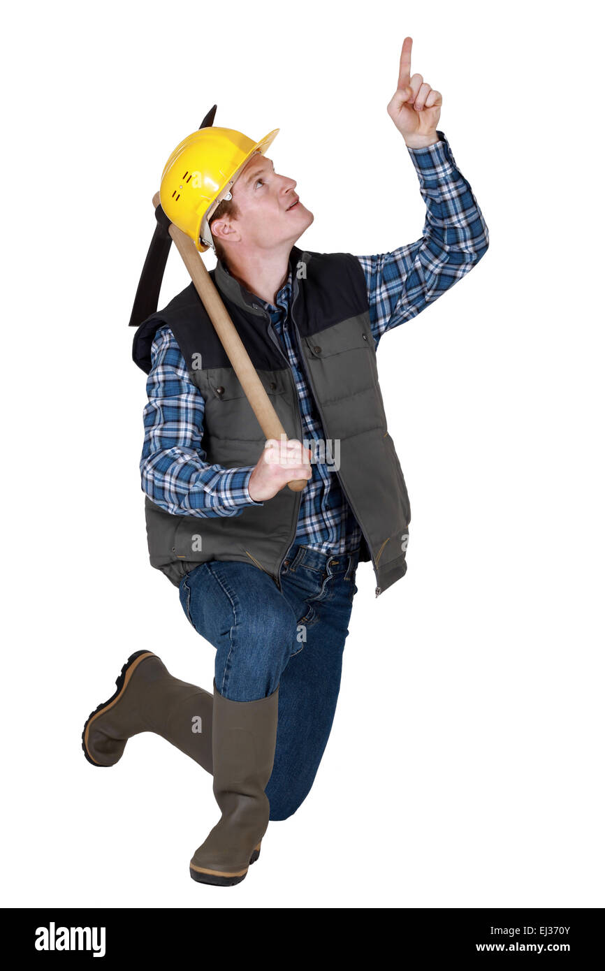 Worker holding pick axe hi-res stock photography and images - Alamy