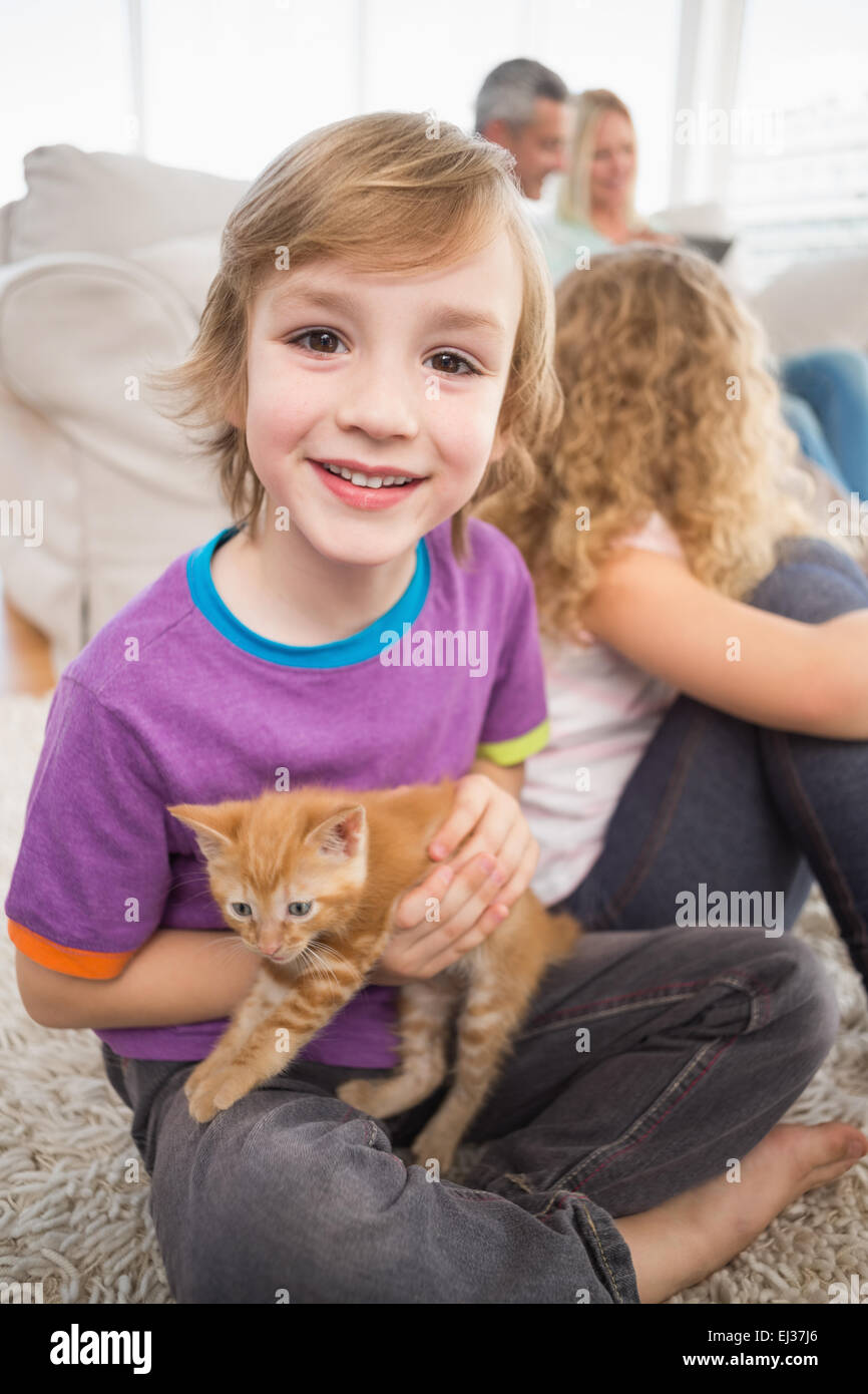 Child boy holding cat kitten hi-res stock photography and images - Alamy