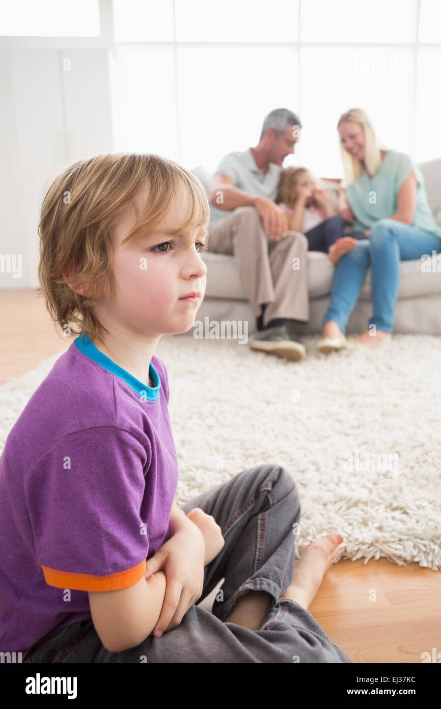 Sad children sitting on floor hi-res stock photography and images - Alamy