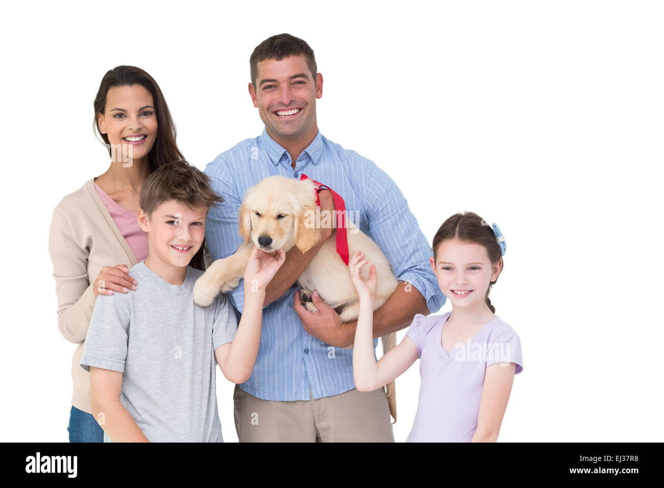 Happy parent and children with dog Stock Photo - Alamy