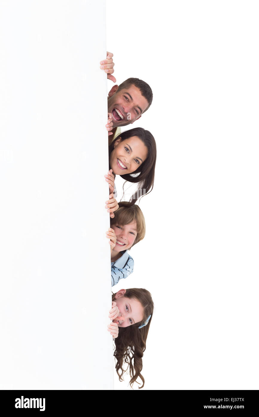 Boy hiding behind mother hi-res stock photography and images - Alamy