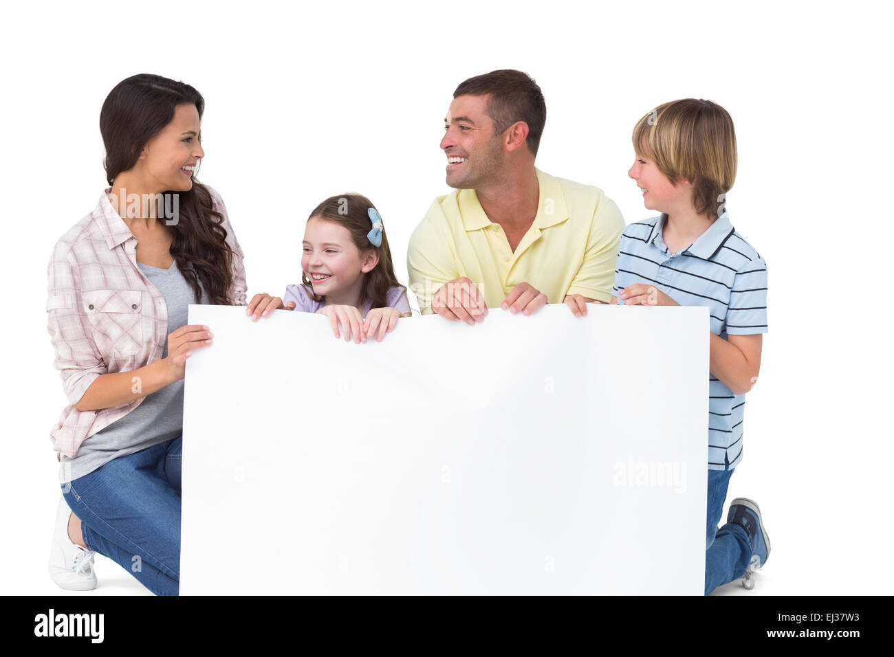 Family with billboard over white background Stock Photo - Alamy