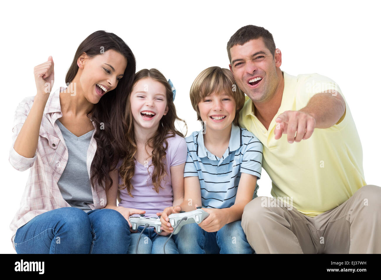 Happy family playing video game Stock Photo - Alamy