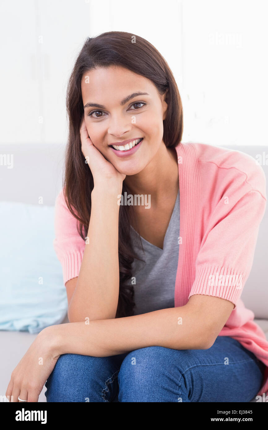 Young woman smiling at home Stock Photo - Alamy