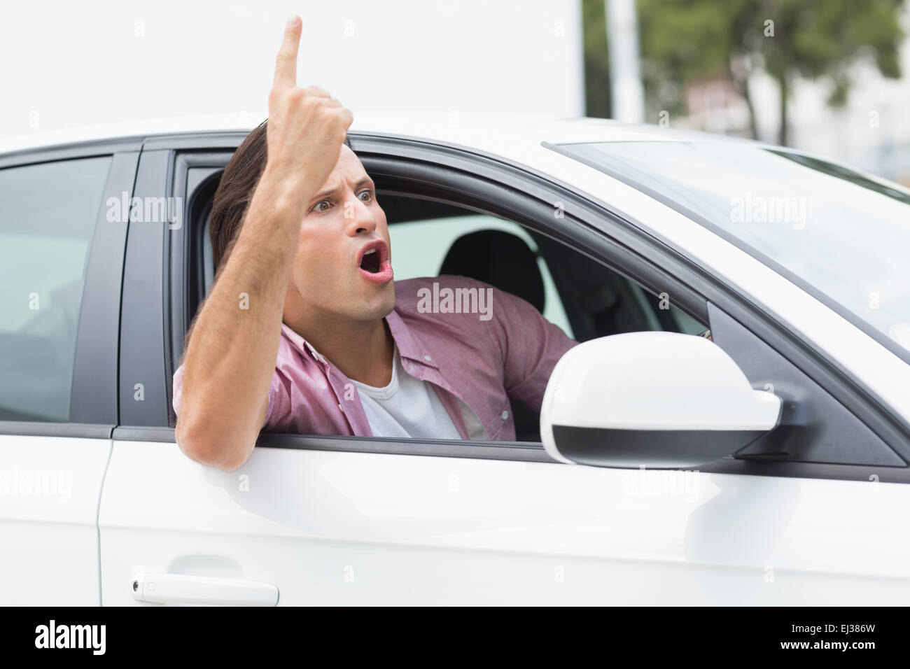 Man having road rage Stock Photo - Alamy