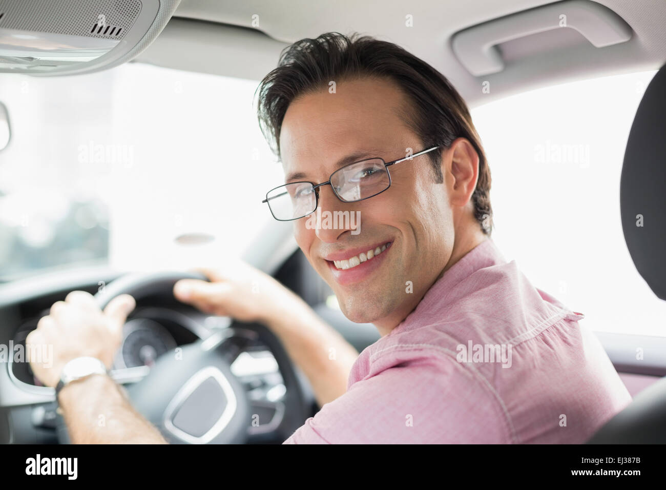 Handsome man driving car 30s hi-res stock photography and images - Alamy