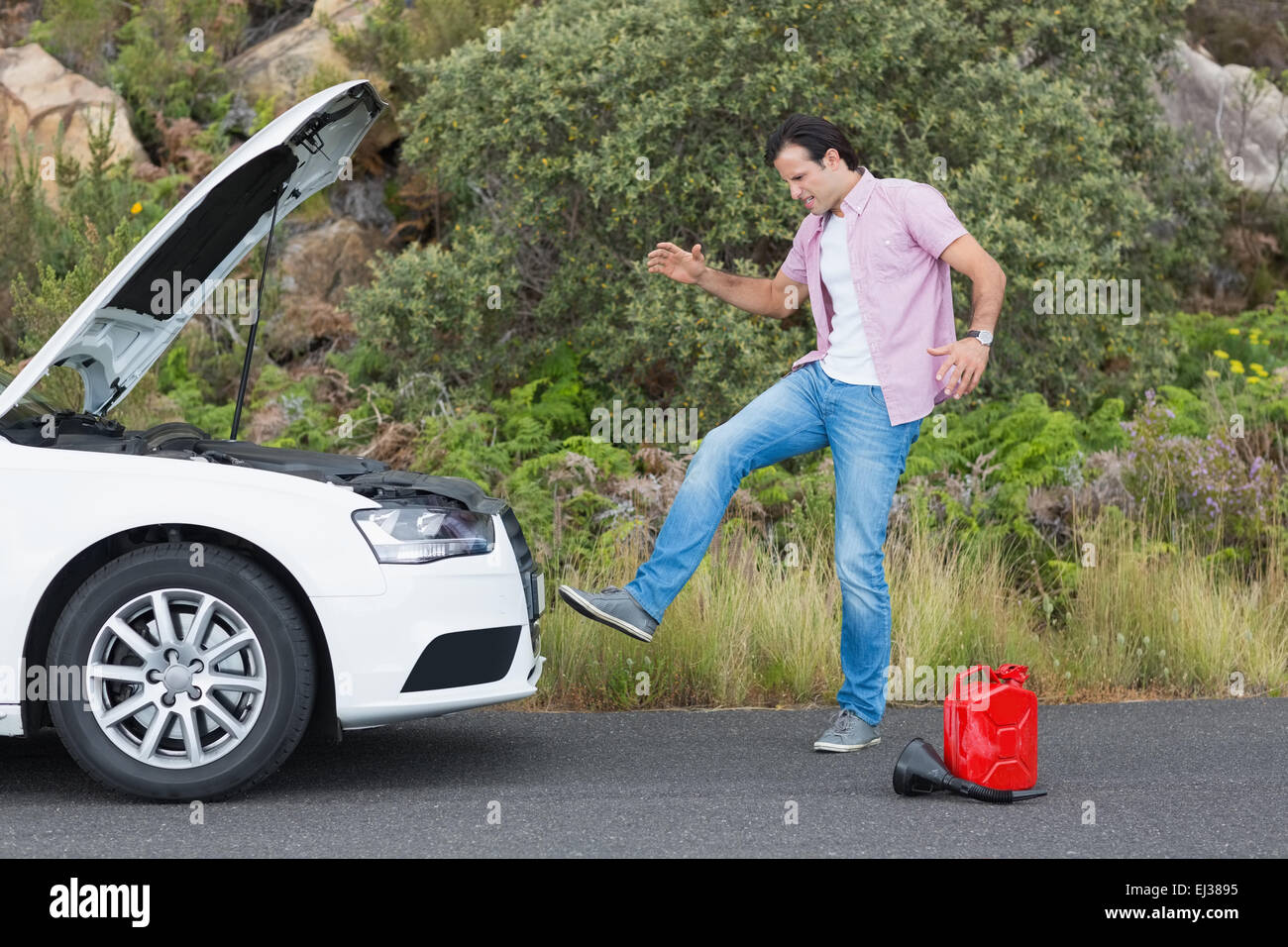 Angry man after a car breakdown Stock Photo - Alamy