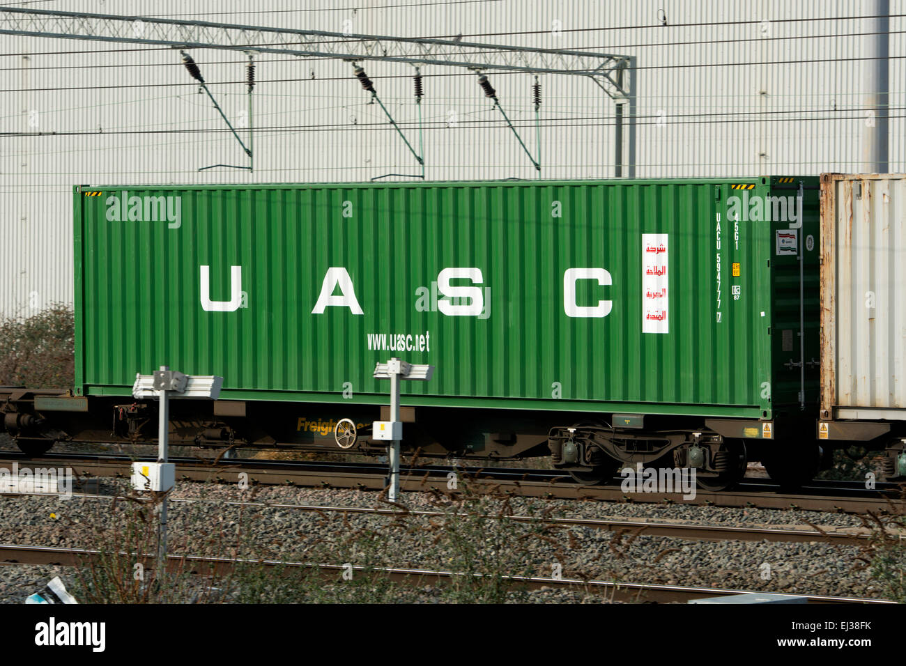 UASC shipping container on a train, Rugby, Warwickshire, UK Stock Photo ...