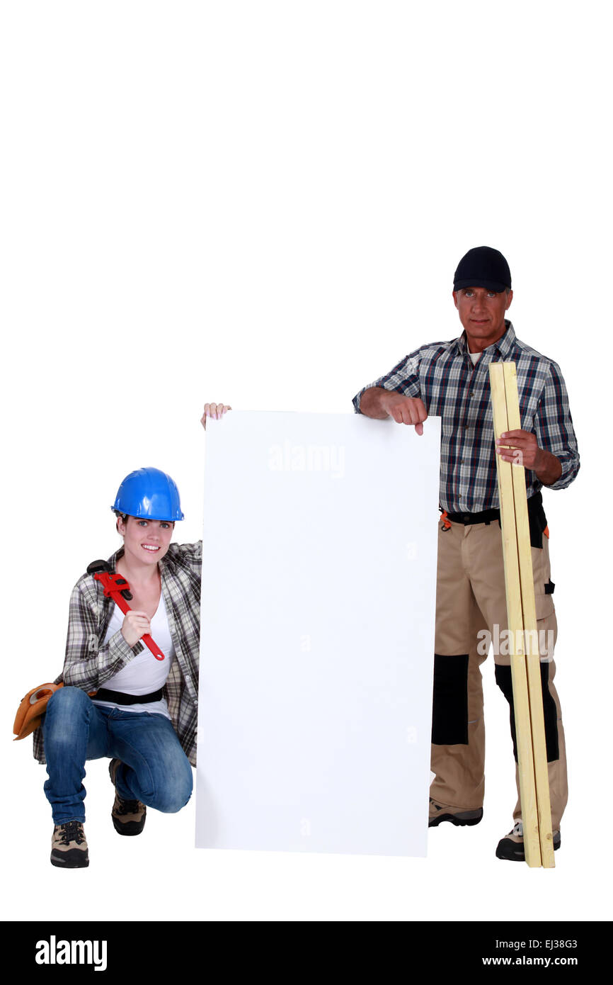 Male carpenter holding wood Cut Out Stock Images & Pictures - Alamy