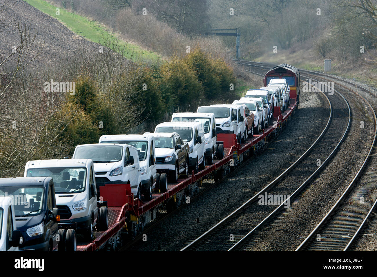 Train carrying new Ford cars and vans at Hatton Bank, Warwickshire, UK ...