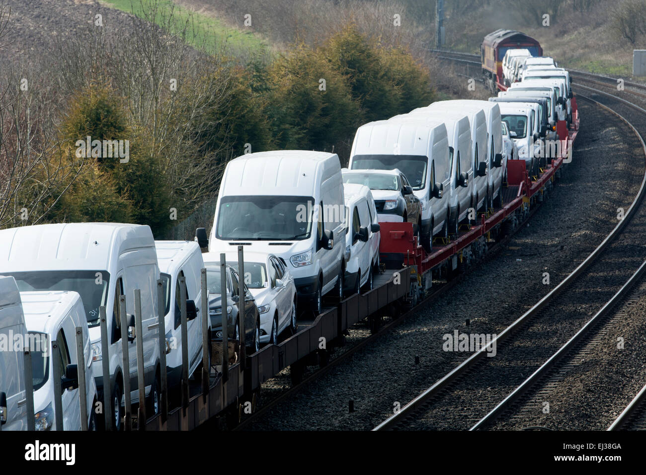 Train carrying new Ford cars and vans at Hatton Bank, Warwickshire, UK ...