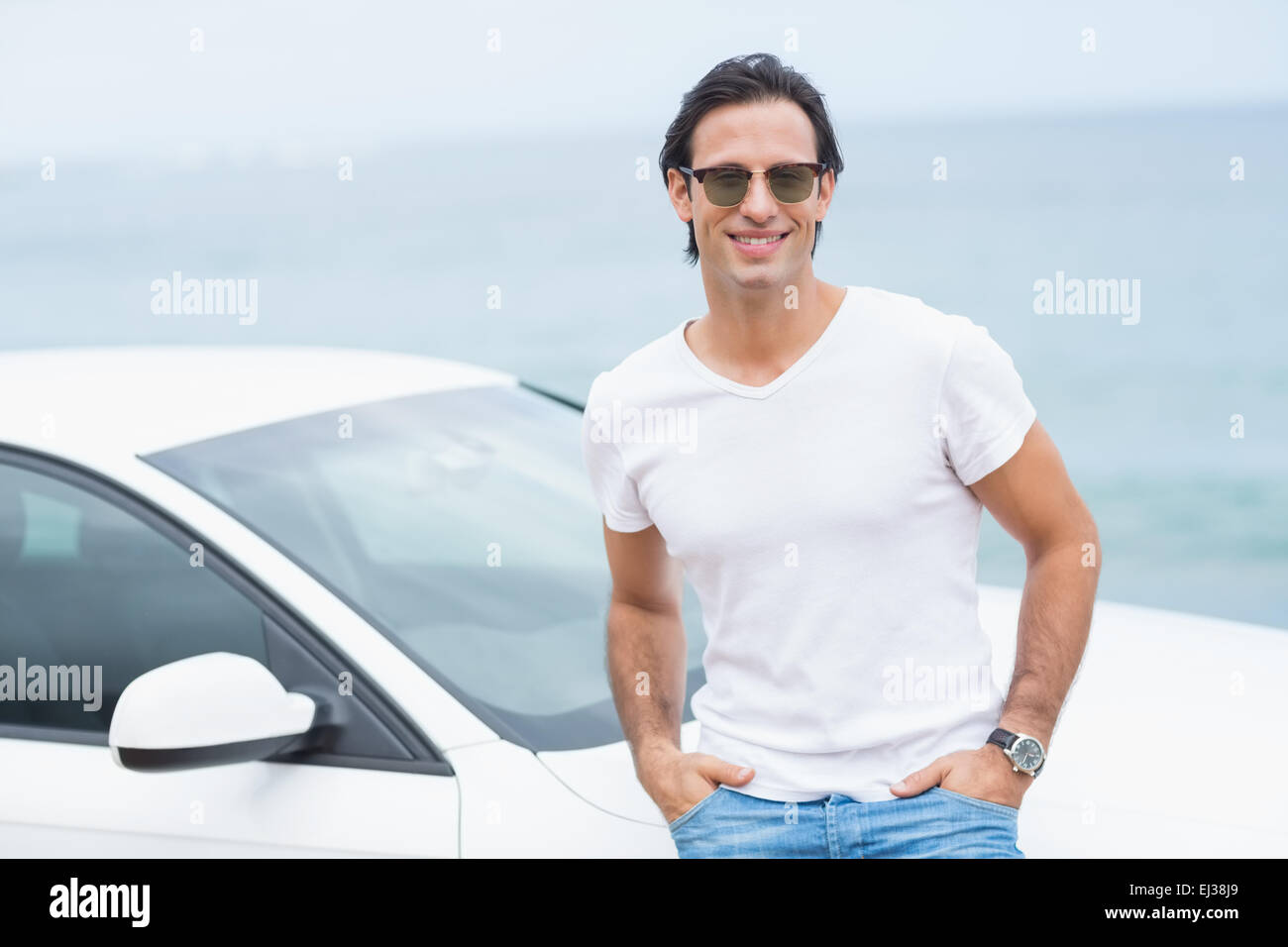 Man smiling at camera Stock Photo - Alamy
