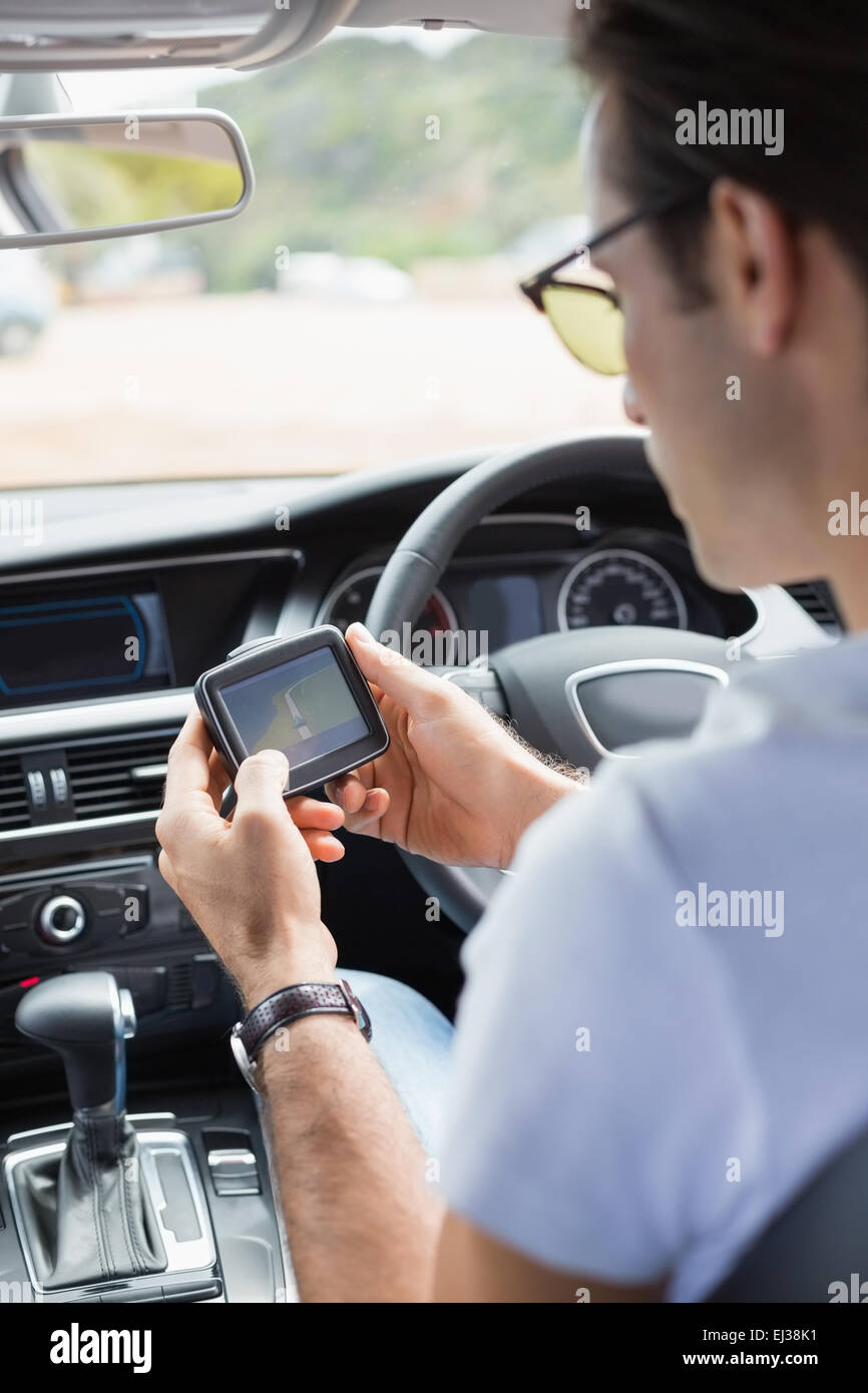 Man using satellite navigation system Stock Photo - Alamy
