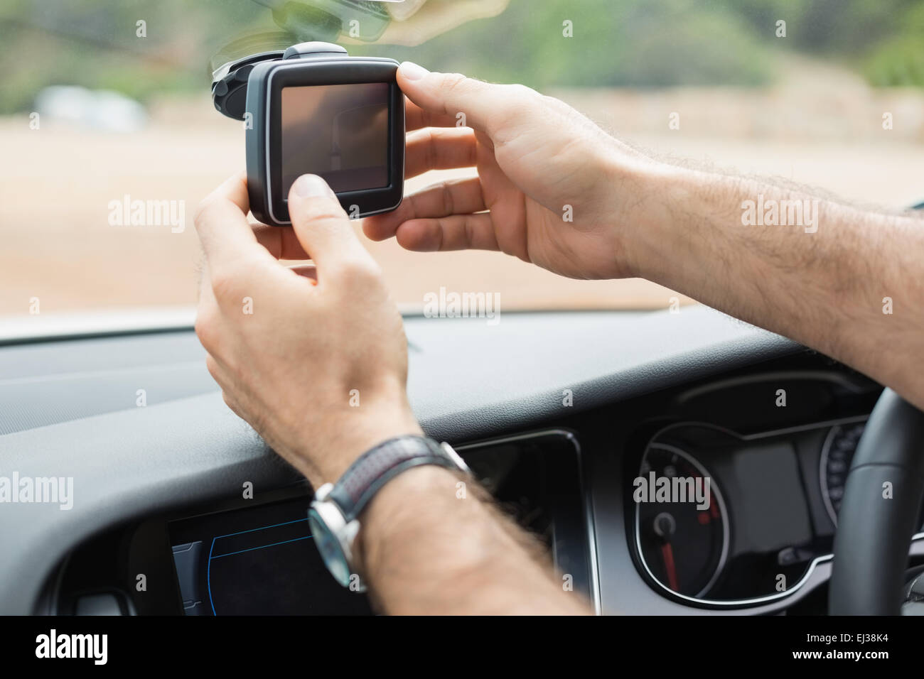Man using satellite navigation system Stock Photo - Alamy