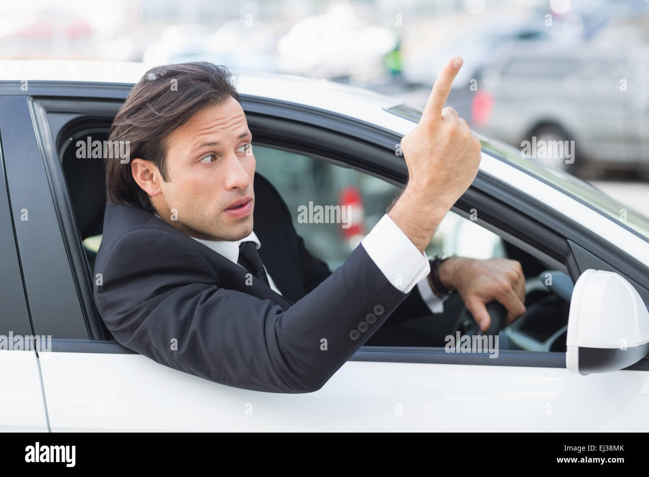 Businessman experiencing road rage Stock Photo - Alamy